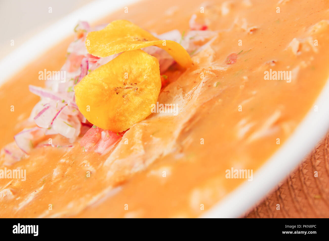 Delicious encebollado fish stew with some chifles inside, traditional ...