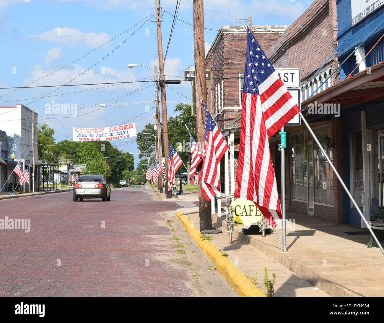 Red brick street in small texas town Stock Photo - Alamy