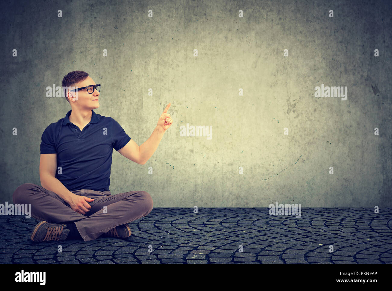 Business man pointing up finger hi-res stock photography and images - Alamy