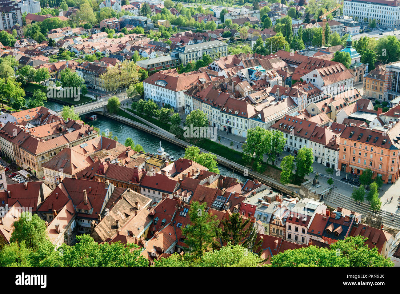 Cityscape of Ljubljana with house architecture and Ljubljanica River of ...
