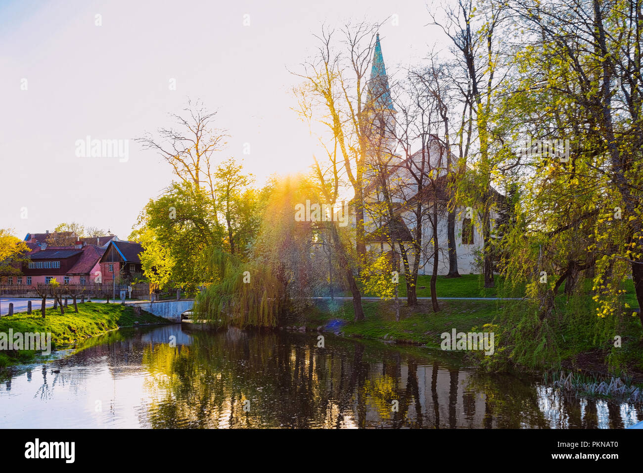 Sunset at Venta River in Kuldiga in Kurzeme in Western Latvia. It used ...