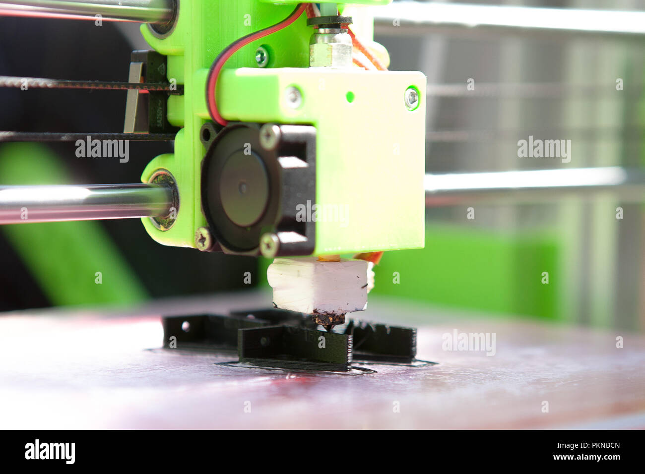 A desktop 3d printer in the laboratory for prints a structure from a ...