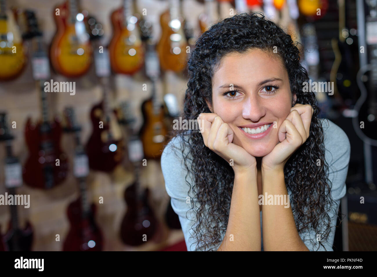 in the guitar store Stock Photo - Alamy