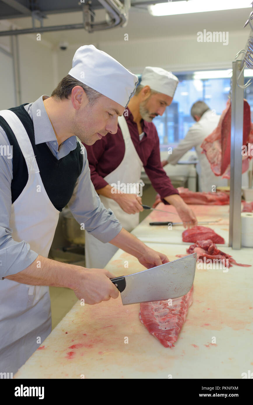 cutting fresh meat Stock Photo - Alamy