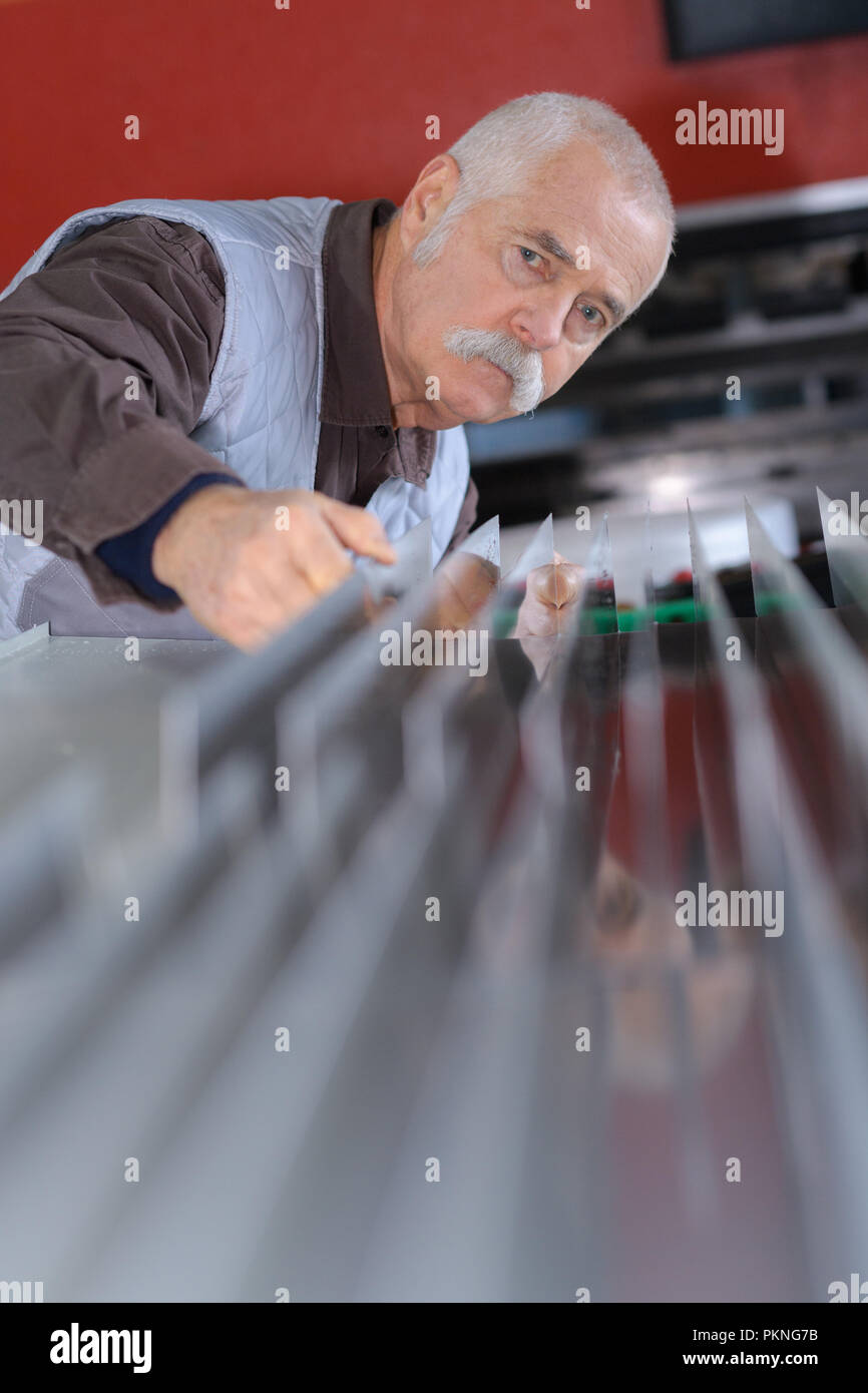 senior man factory employee at work Stock Photo - Alamy