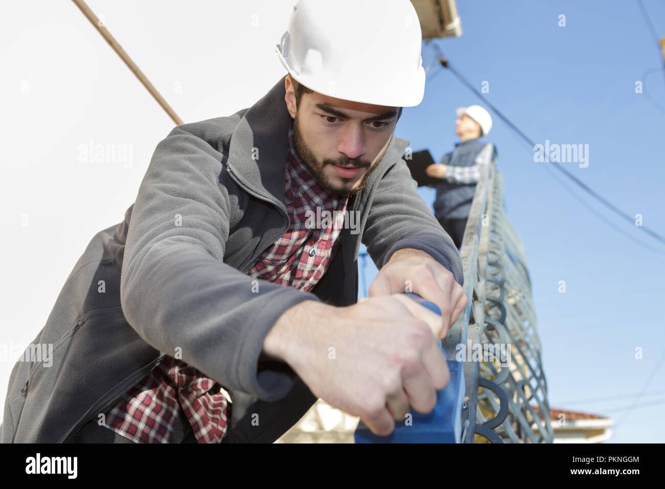 construction worker working outdoors Stock Photo - Alamy