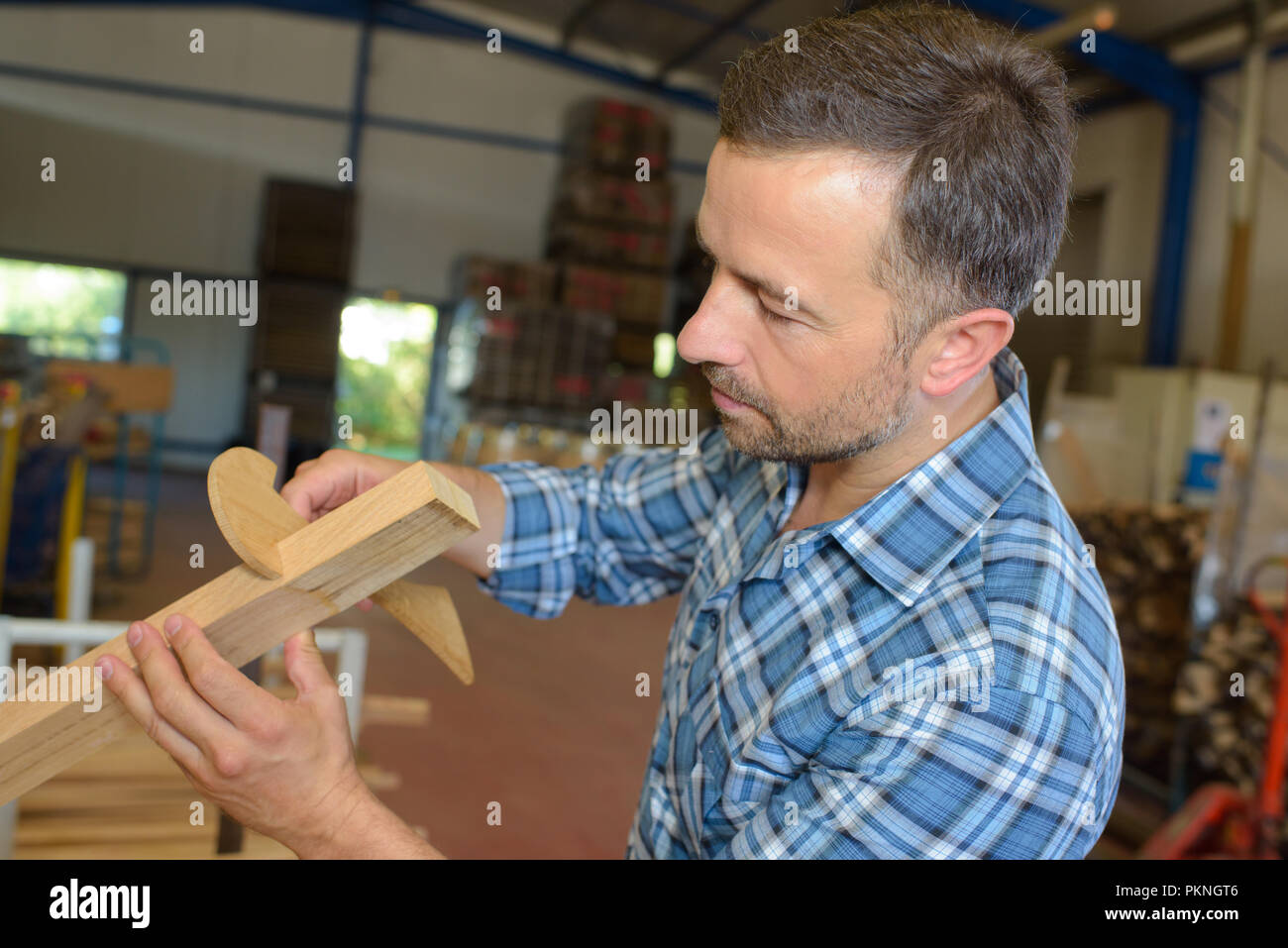 sawmill employee working with wood tools and machinery Stock Photo - Alamy