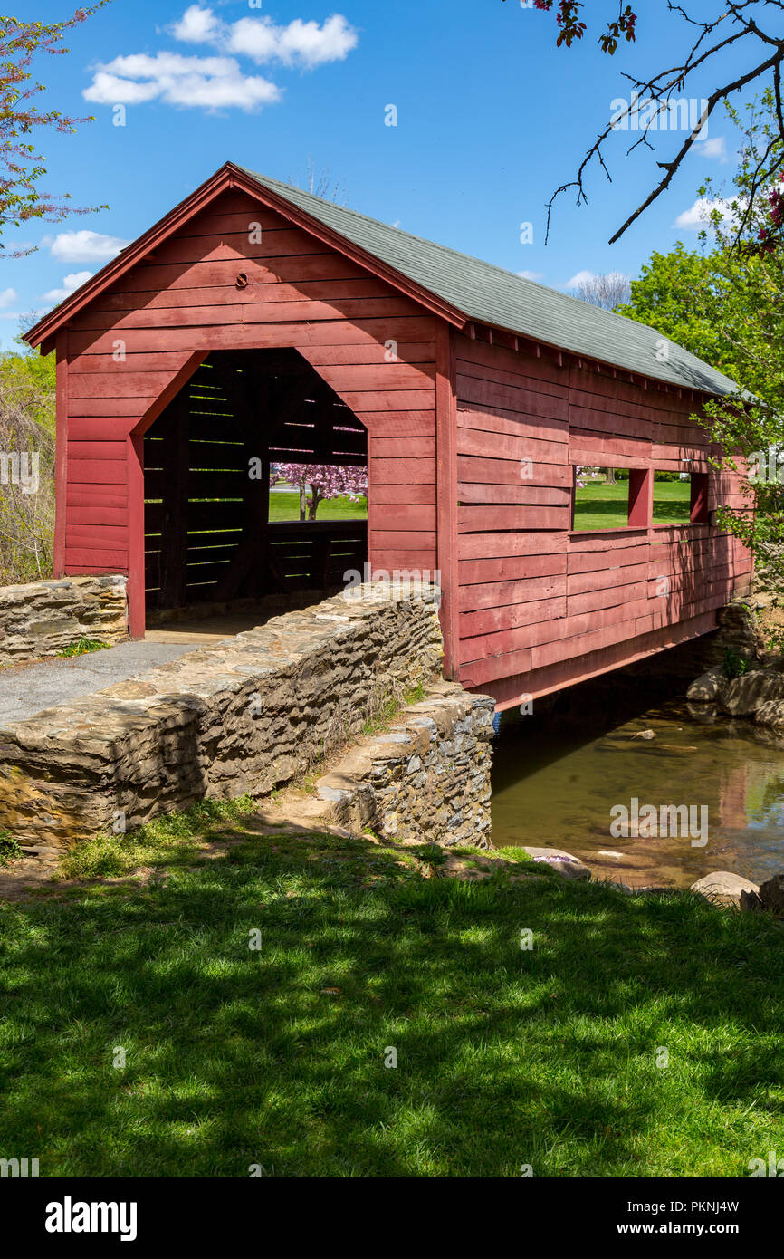Frederick, MD, USA - April 26, 2015: Covered bridge for foot traffic in ...
