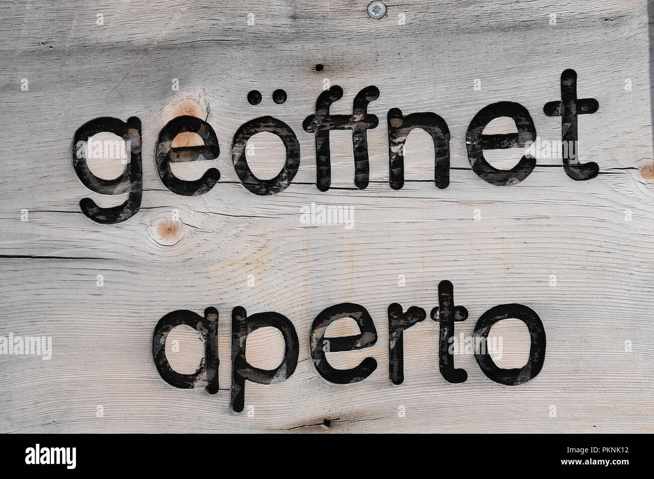 Italy, Trentino Alto Adige, Valle Lunga, Open sign in German & Italian ...