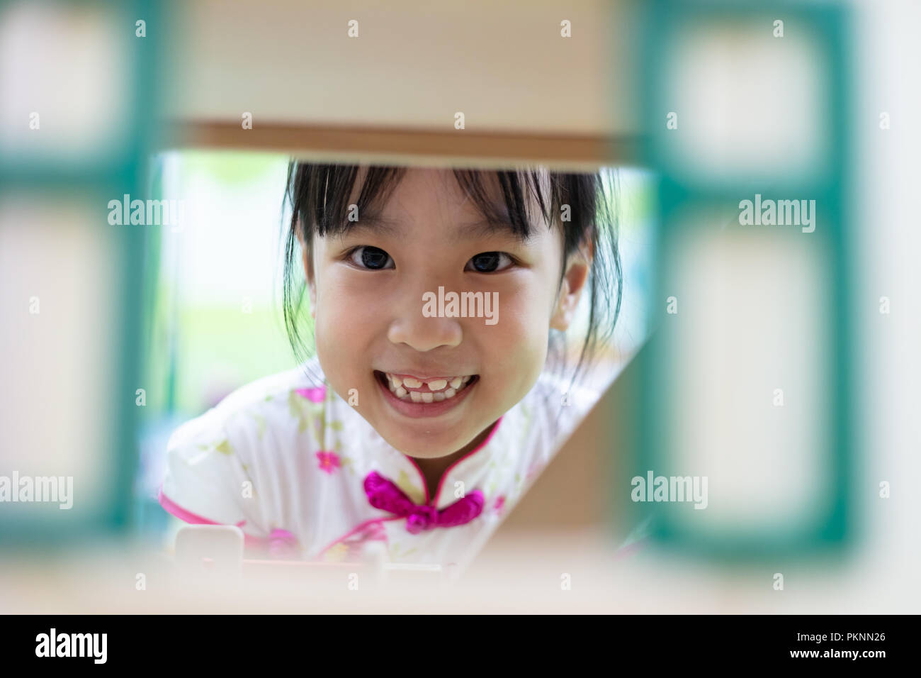 Asian Chinese little girl playing at indoor playground Stock Photo - Alamy