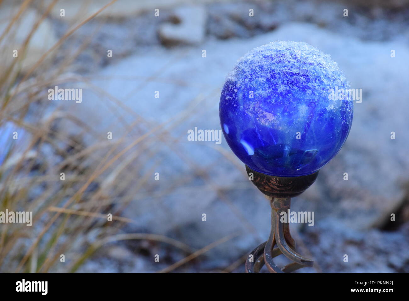 Light dusting of snow on backyard globe in Colorado Stock Photo - Alamy