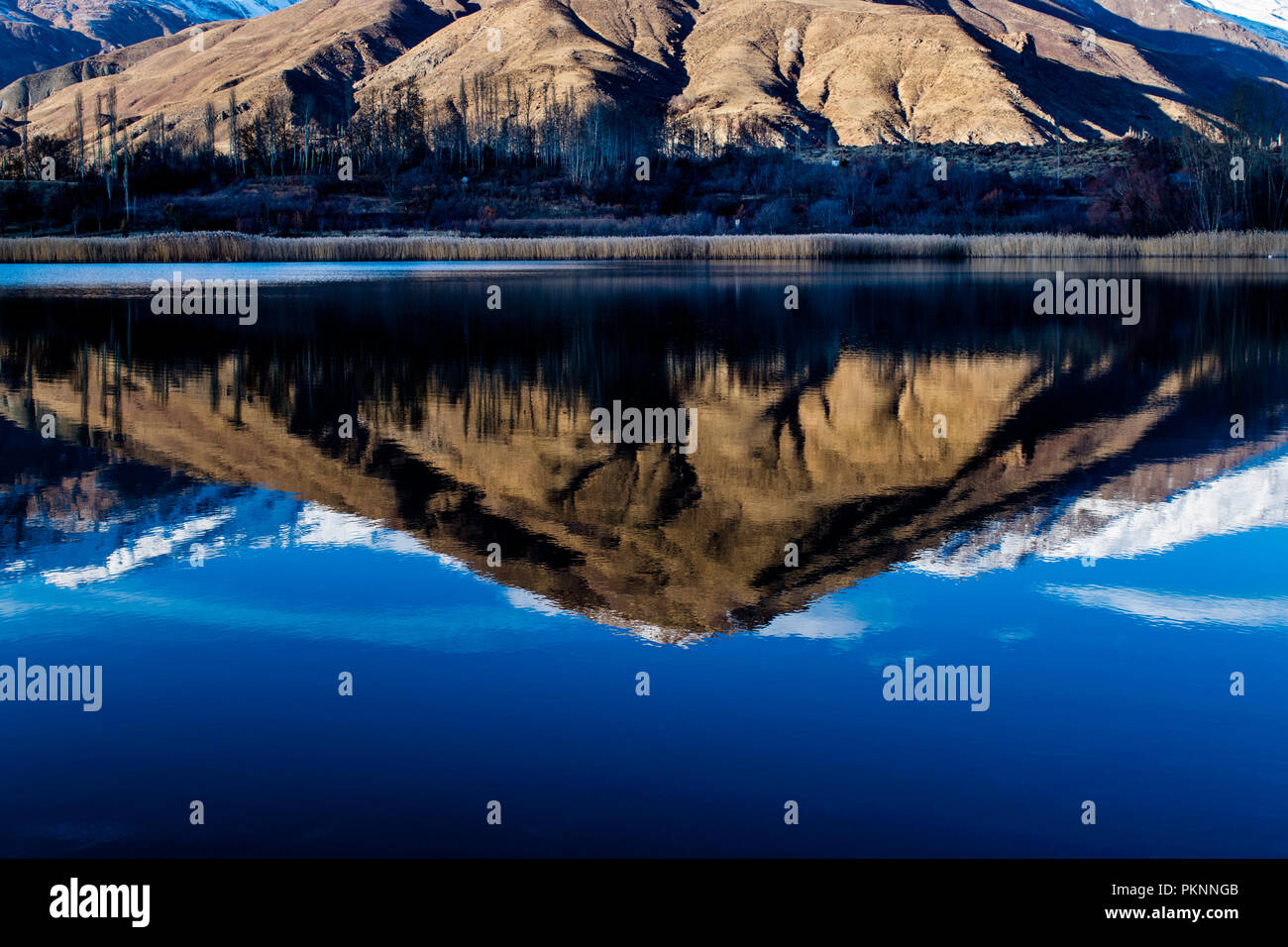 reflection of mount on Ovan lake Stock Photo - Alamy