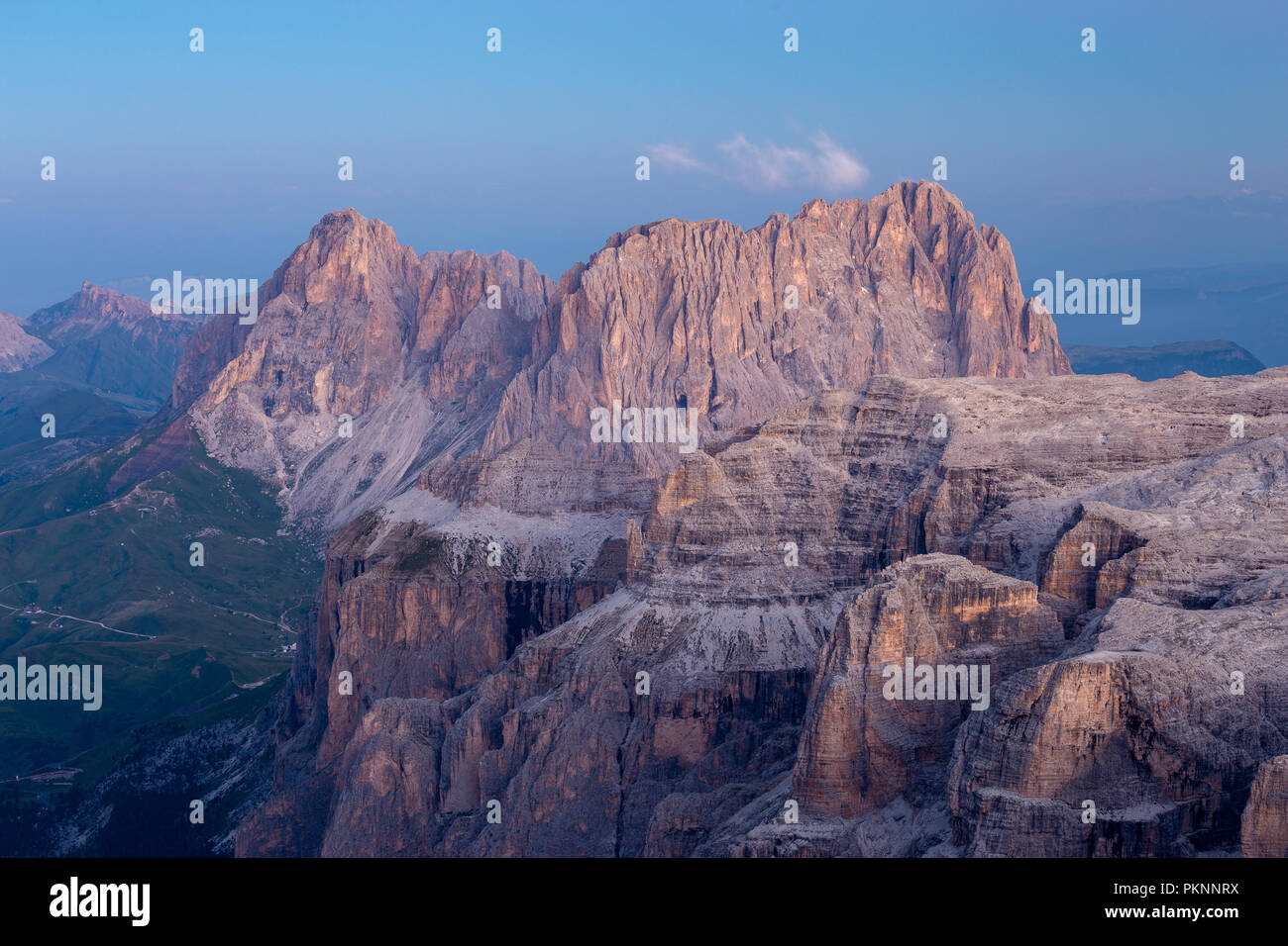The Sassolungo and Sella groups at morning light. The Dolomites ...