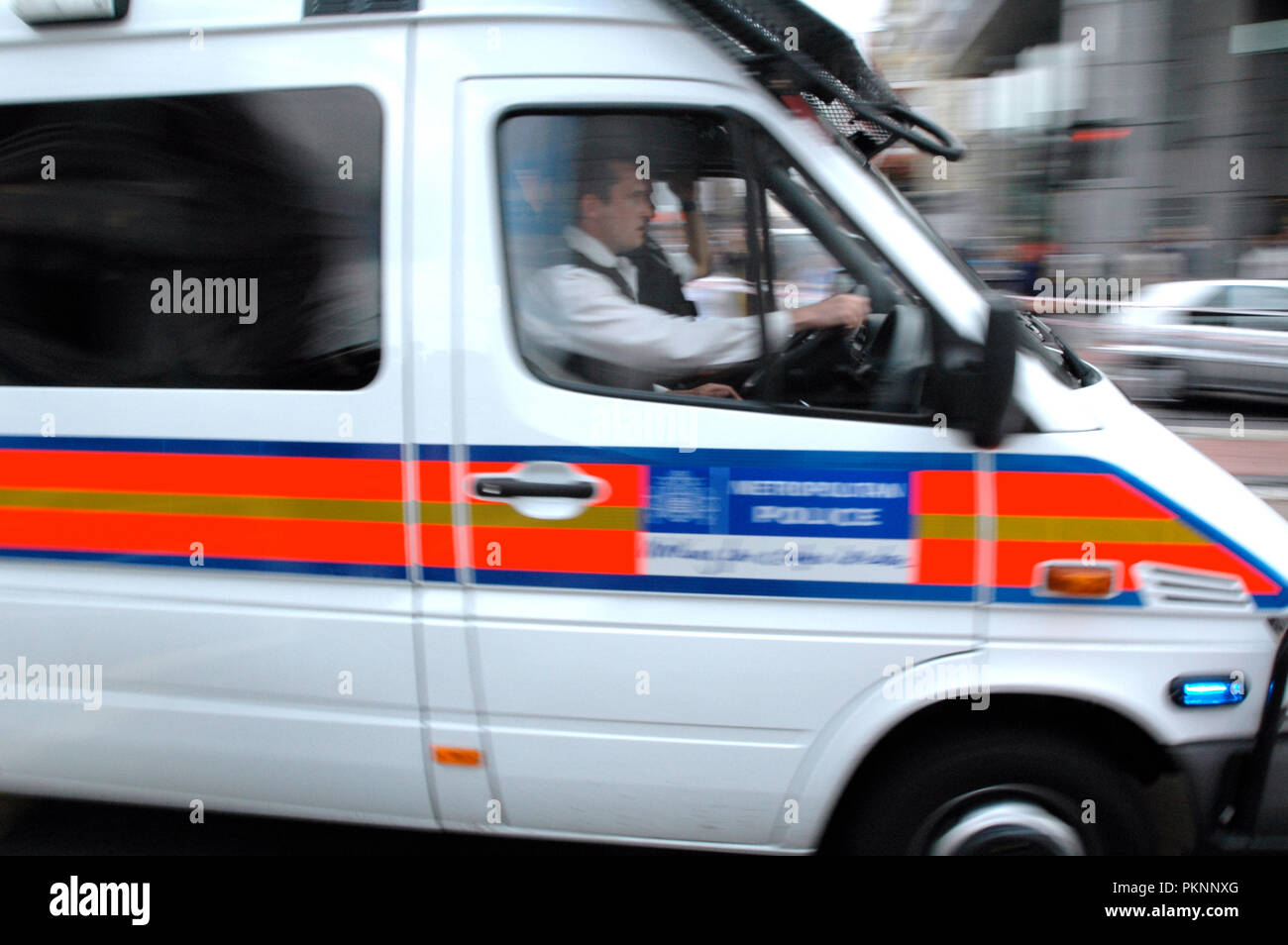 Speeding Police van, London, England Stock Photo - Alamy