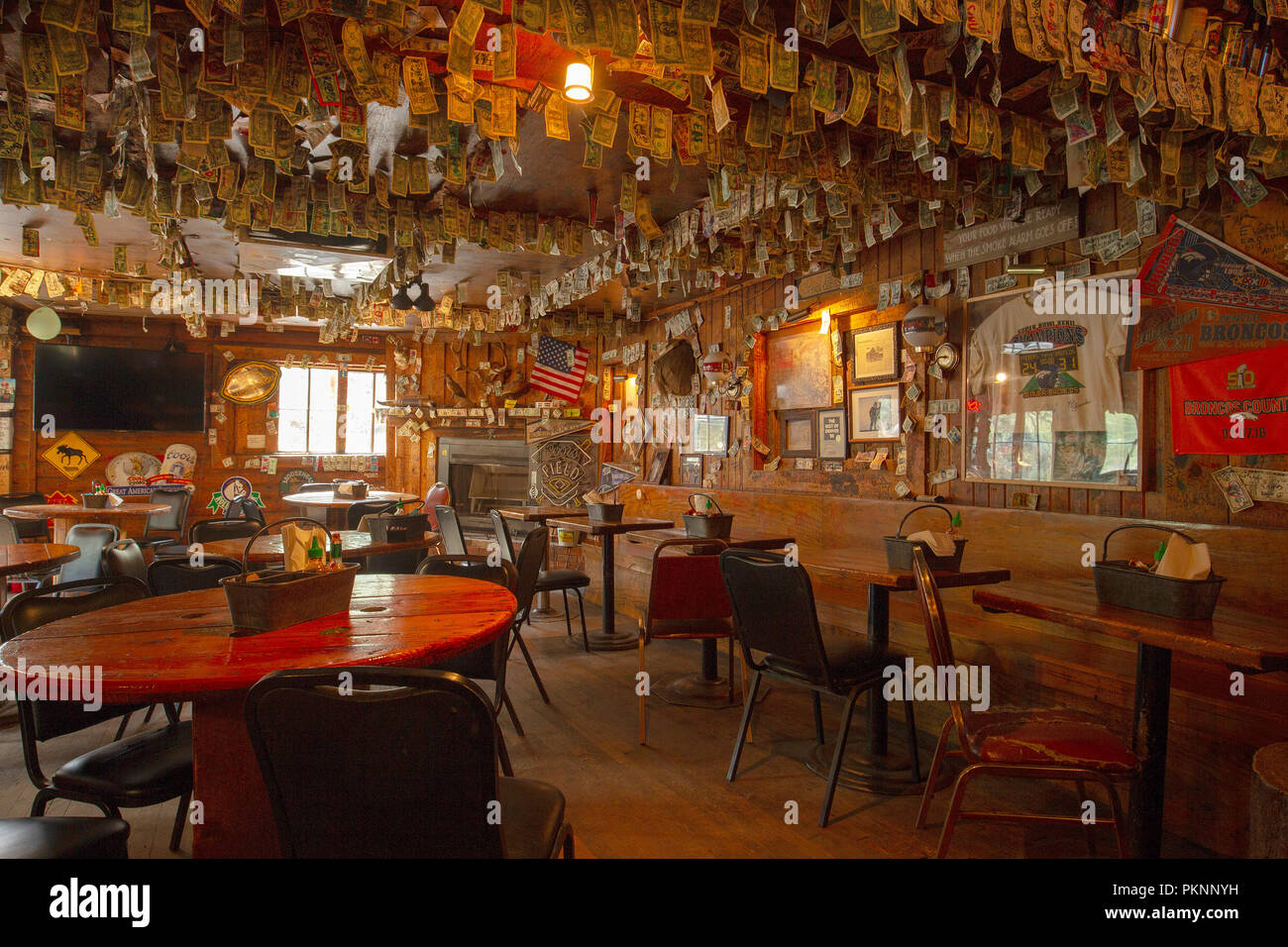 Bucksnort saloon near Pine Grove Colorado.A A mountain bar with dollar ...