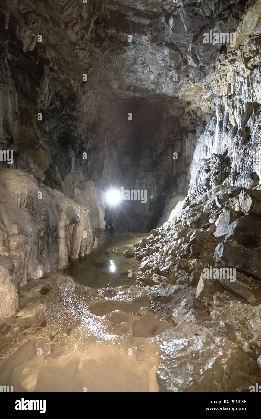 Spar Cave Isle of Skye Person with Torch Stock Photo - Alamy