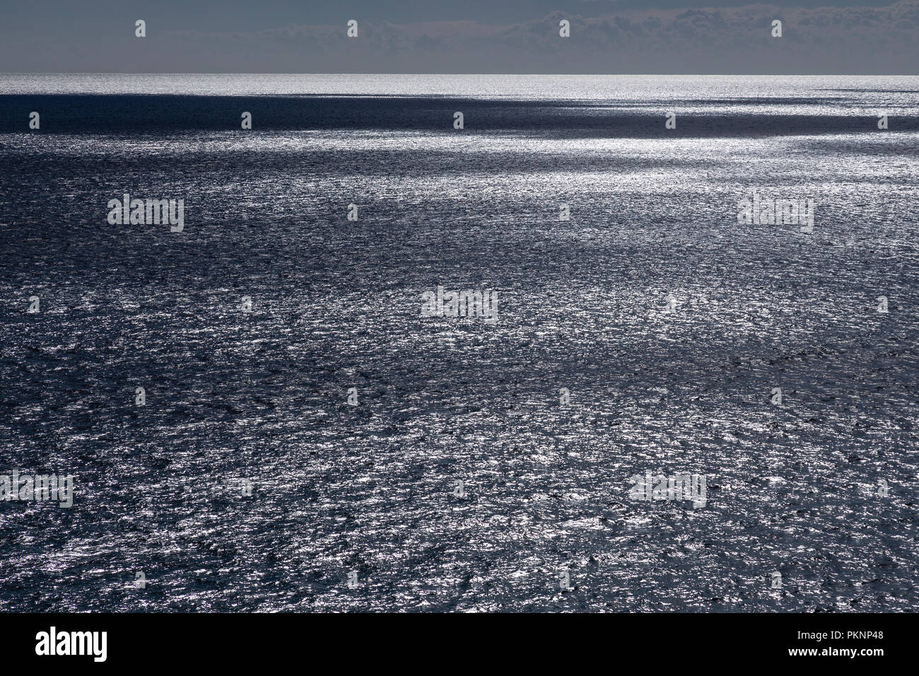 Sunlight and shadow on the Atlantic Ocean Stock Photo - Alamy