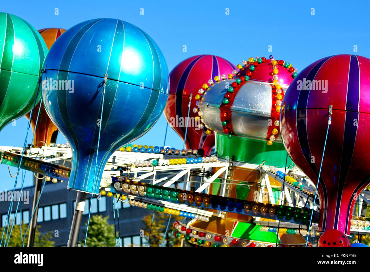 Carousel with Balloon in the amusement park Stock Photo - Alamy