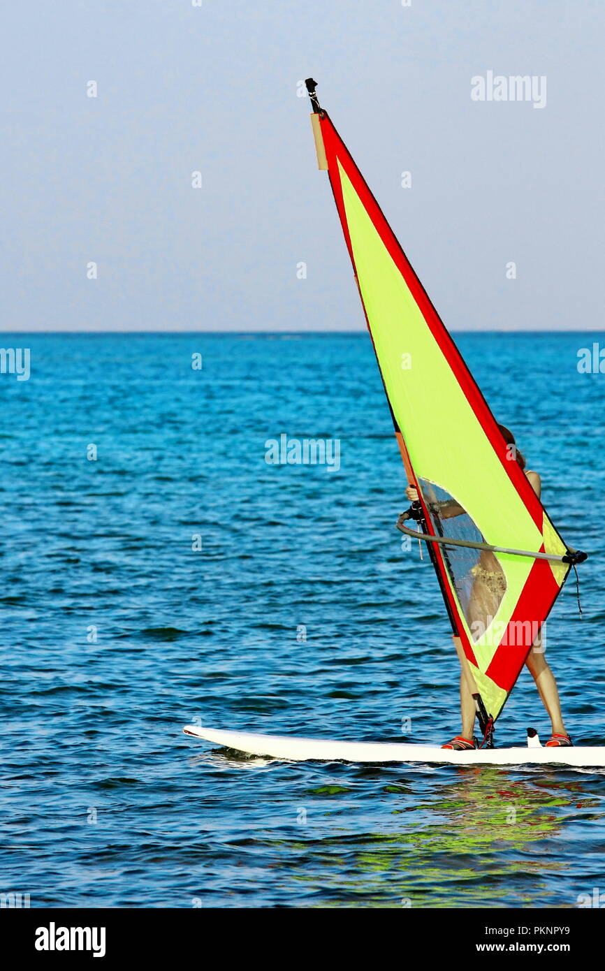 Woman windsurfer in wave hi-res stock photography and images - Alamy