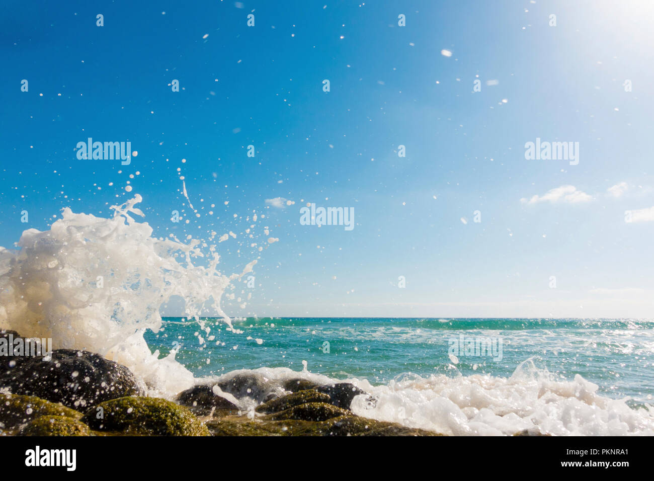 Sea water splashes against rocks hi-res stock photography and images ...