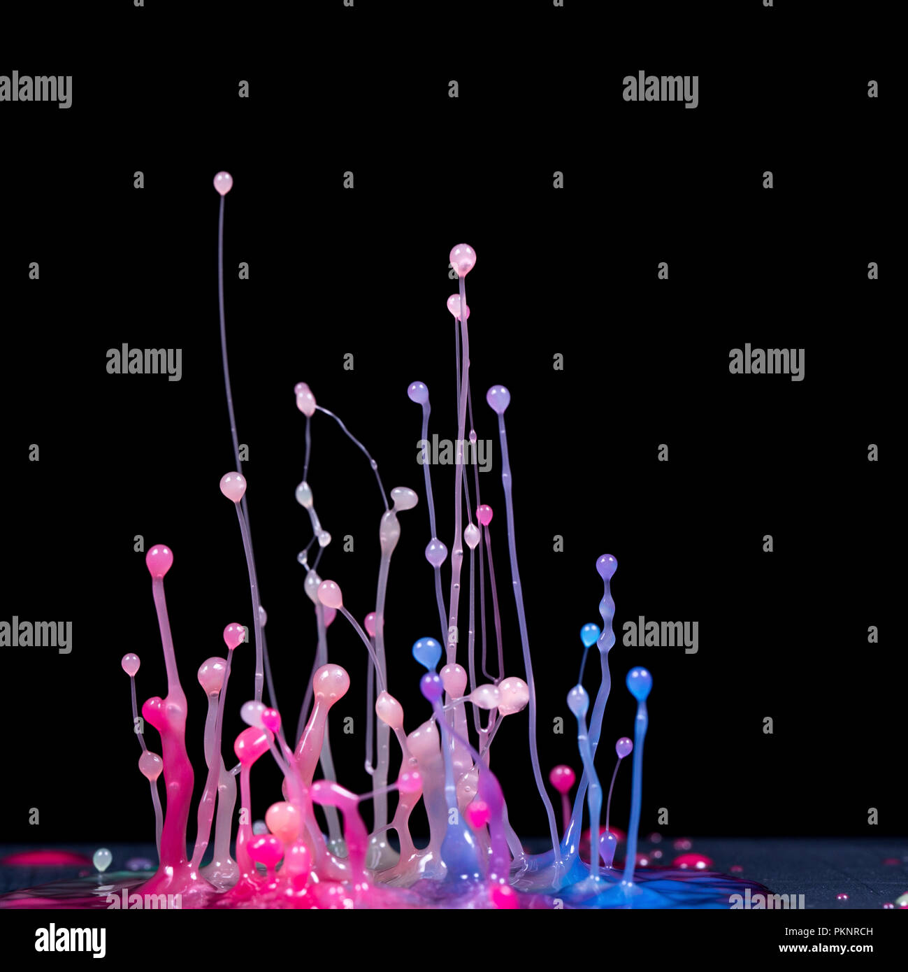 Pink paint splashing hi-res stock photography and images - Alamy