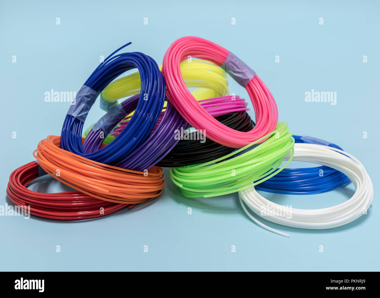 Plastic filaments for 3D printing Stock Photo - Alamy