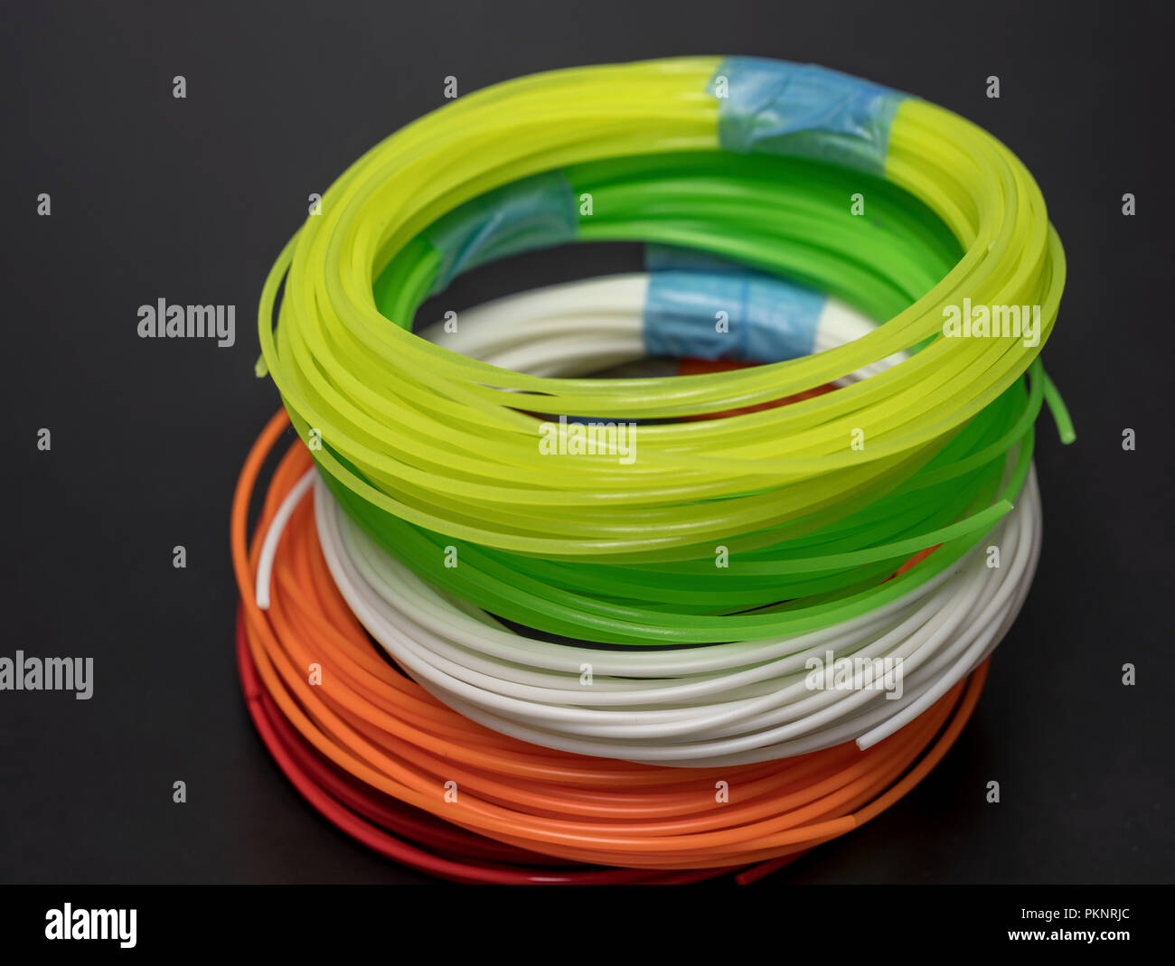 Plastic filaments for 3D printing Stock Photo - Alamy