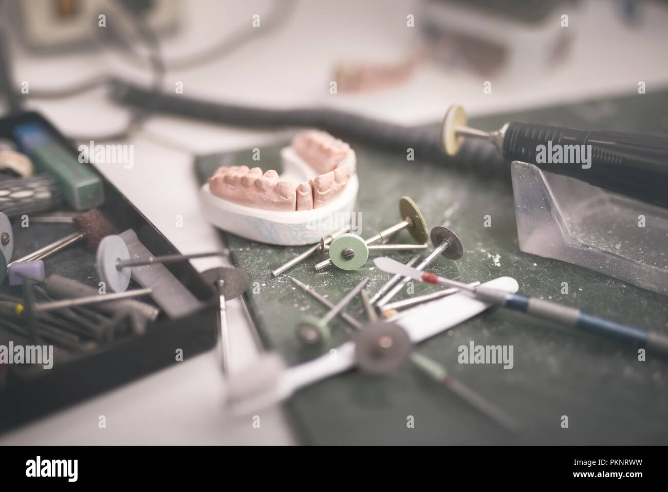 Artificial tooth and dental prosthesis being made Stock Photo - Alamy