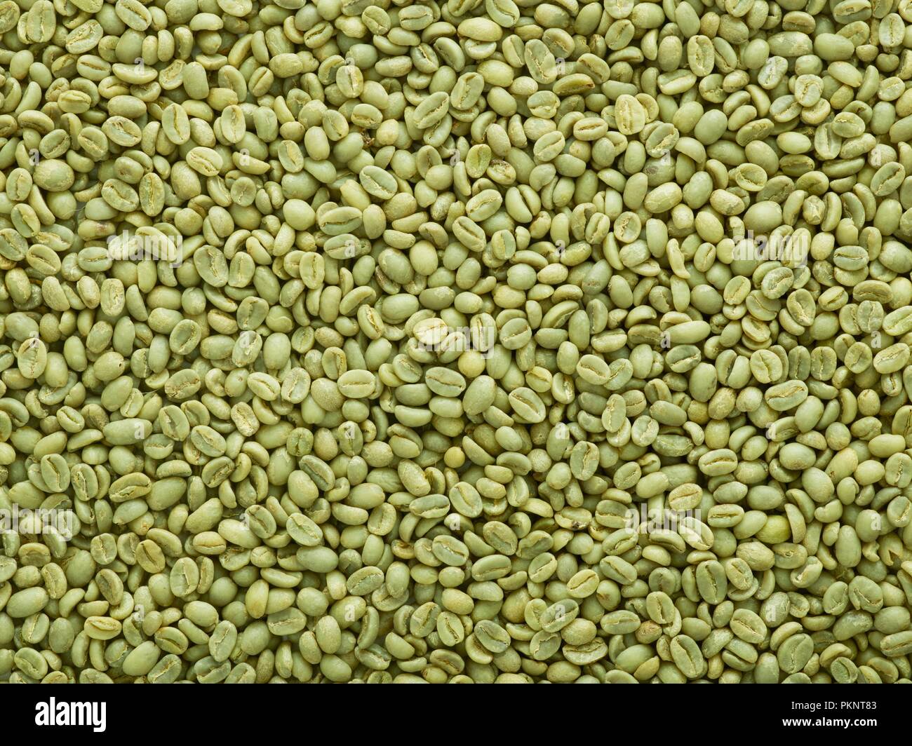 Green coffee beans, full frame Stock Photo - Alamy