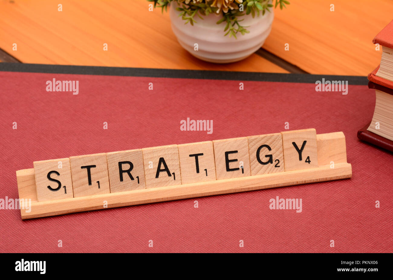 Strategy & planning theme with wooden background Stock Photo - Alamy