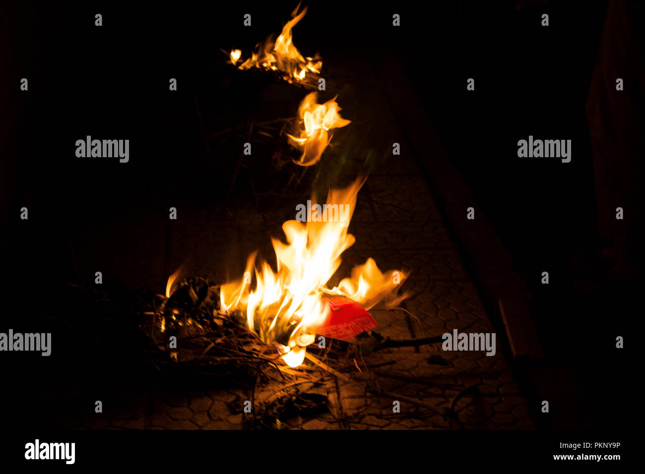 this is yellow orange fire burning paper Stock Photo - Alamy
