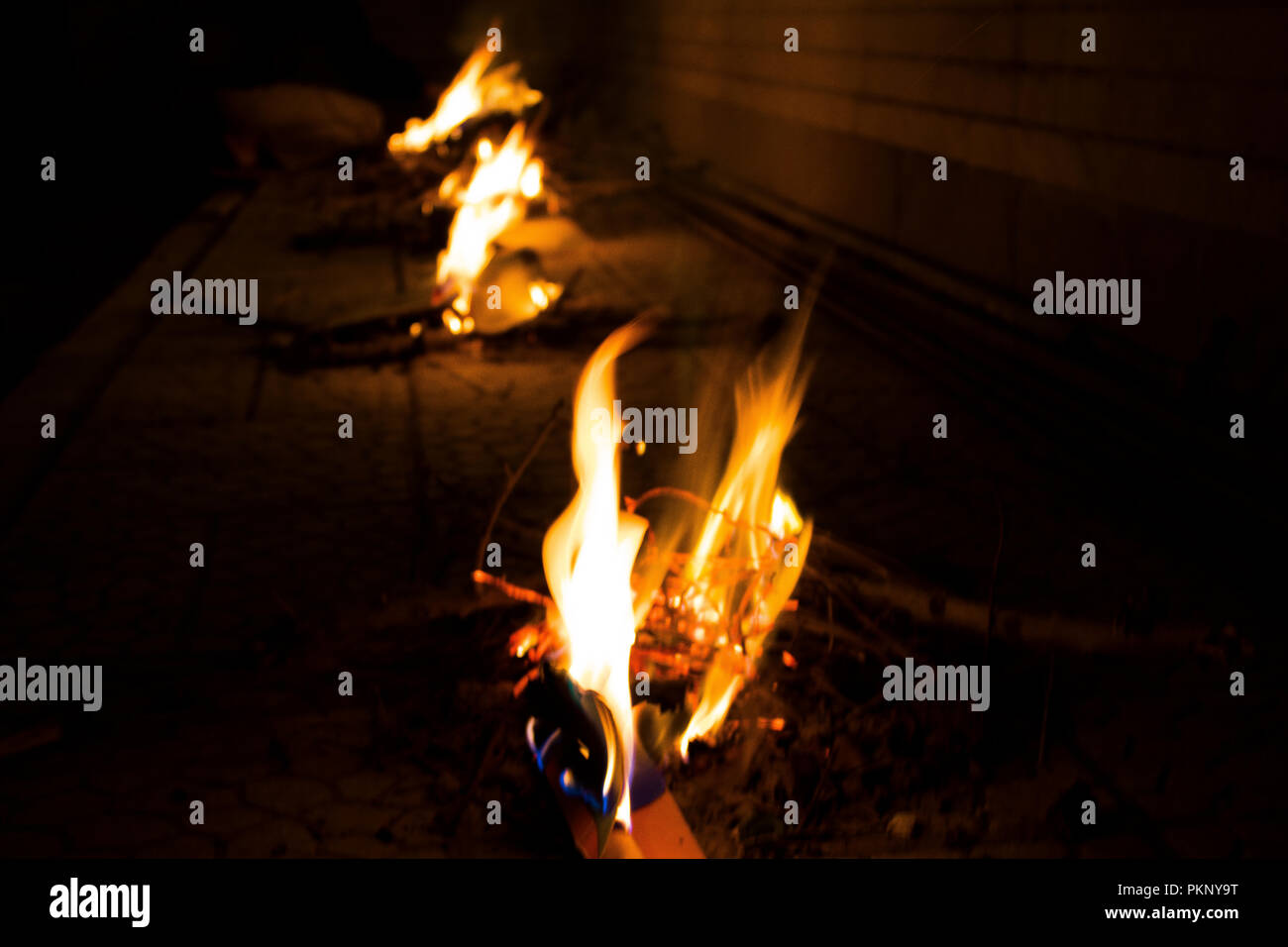 this is yellow orange fire burning paper Stock Photo - Alamy