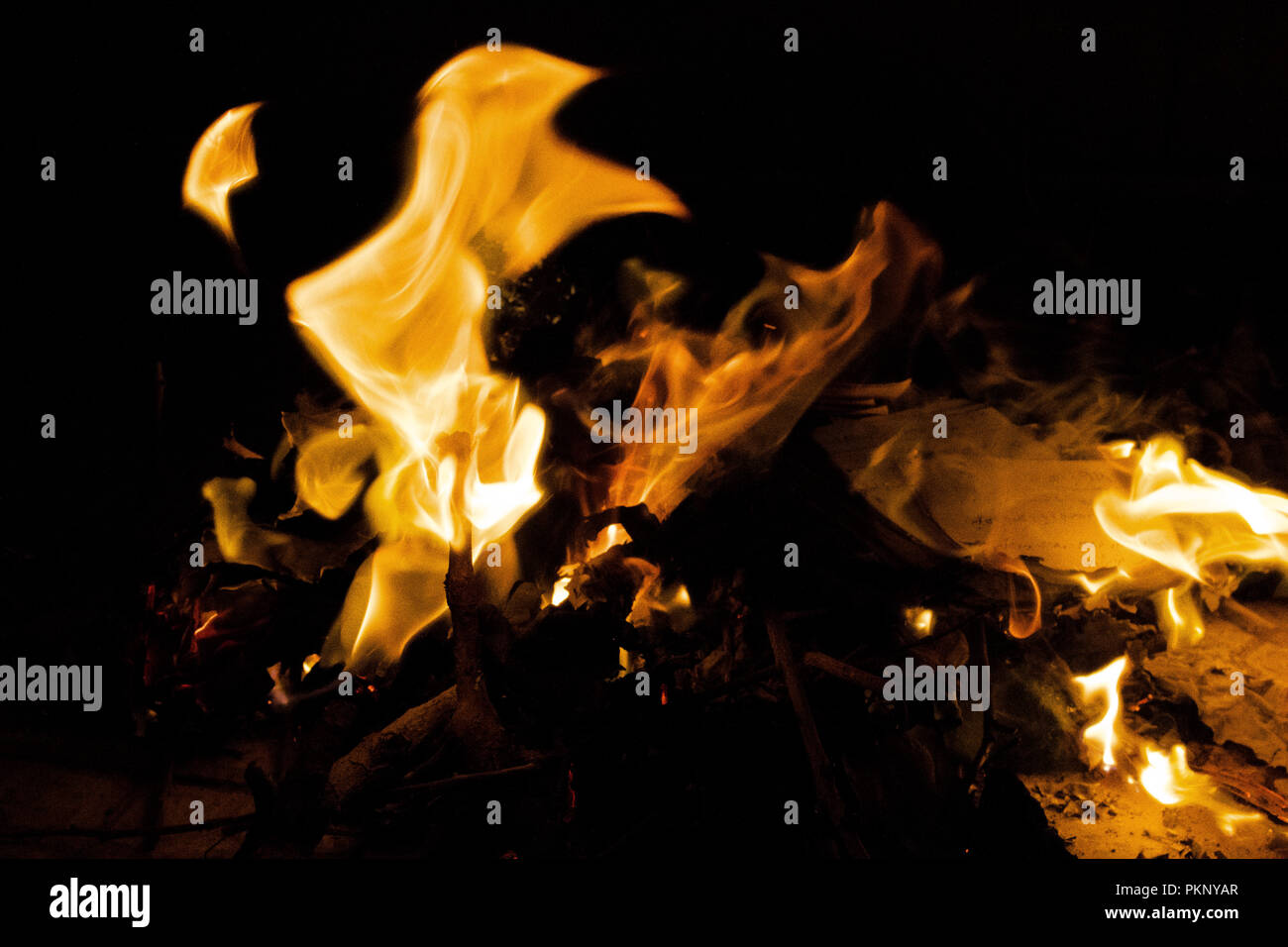 this is yellow orange fire burning paper Stock Photo - Alamy