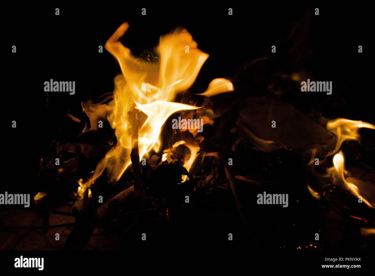 this is yellow orange fire burning paper Stock Photo - Alamy