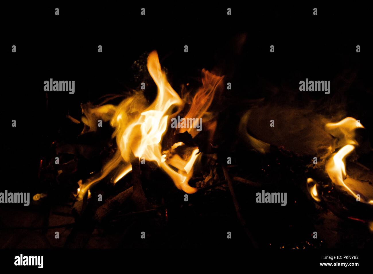 this is yellow orange fire burning paper Stock Photo - Alamy