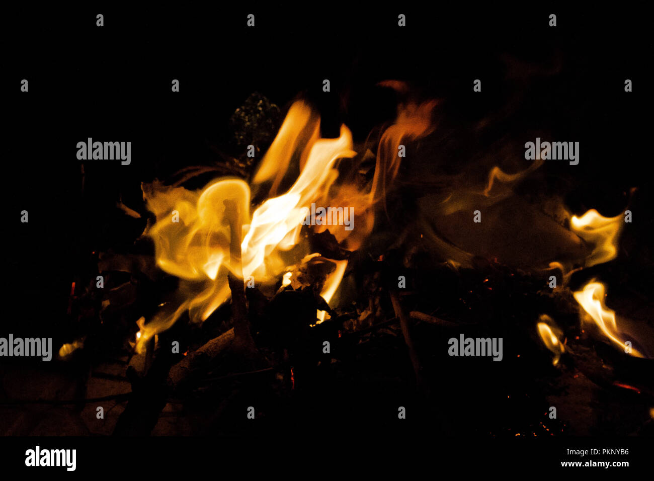 this is yellow orange fire burning paper Stock Photo - Alamy