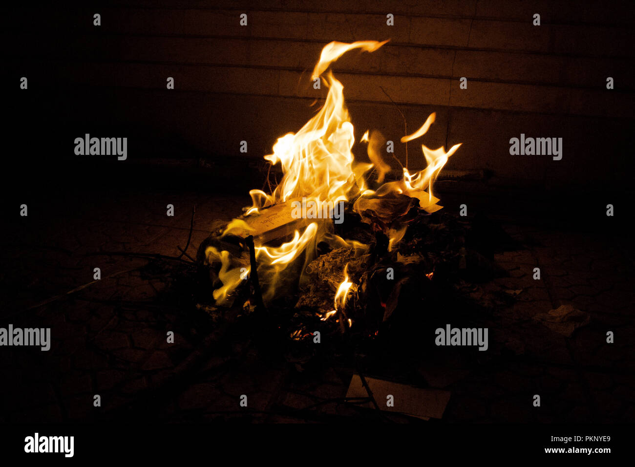 this is yellow orange fire burning paper Stock Photo - Alamy