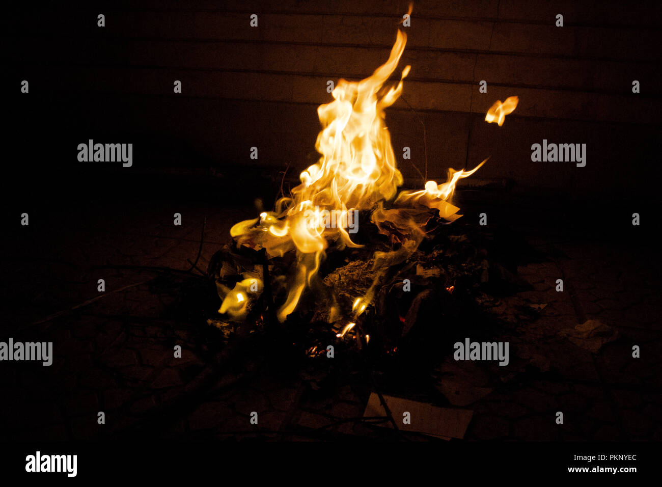 this is yellow orange fire burning paper Stock Photo - Alamy