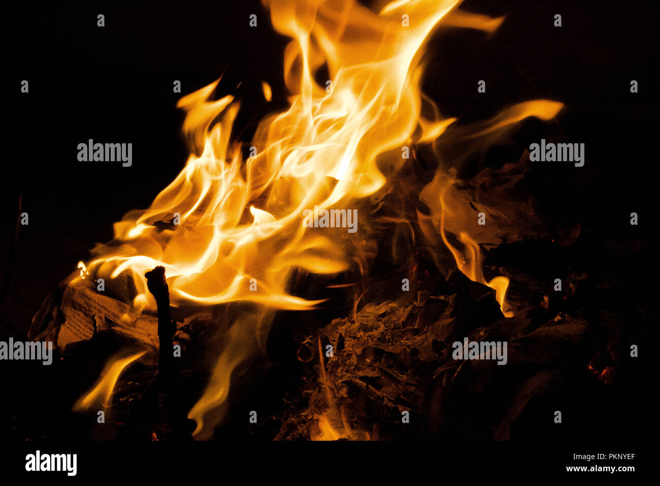 this is yellow orange fire burning paper Stock Photo - Alamy