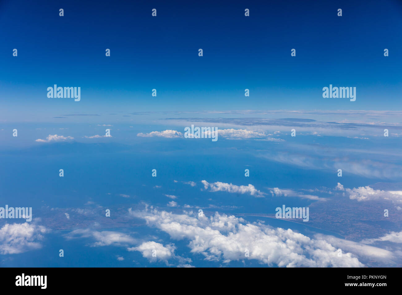 Cloudy sky background. View out of an airplane window Stock Photo - Alamy