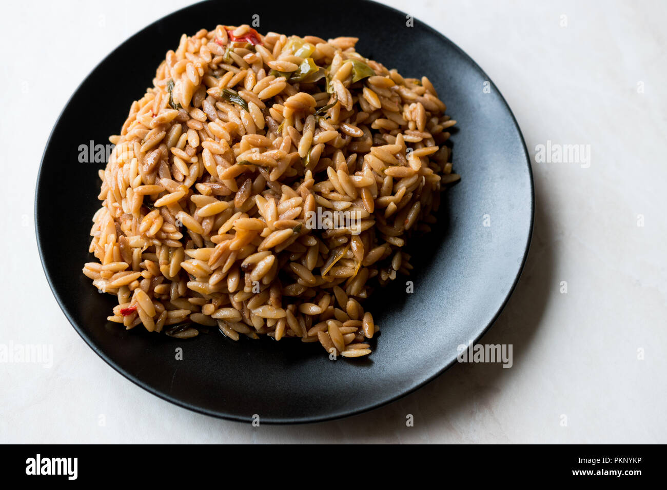 Turkish Style Cooked Orzo Pasta in Black Plate / Pilav or Pilaf ...