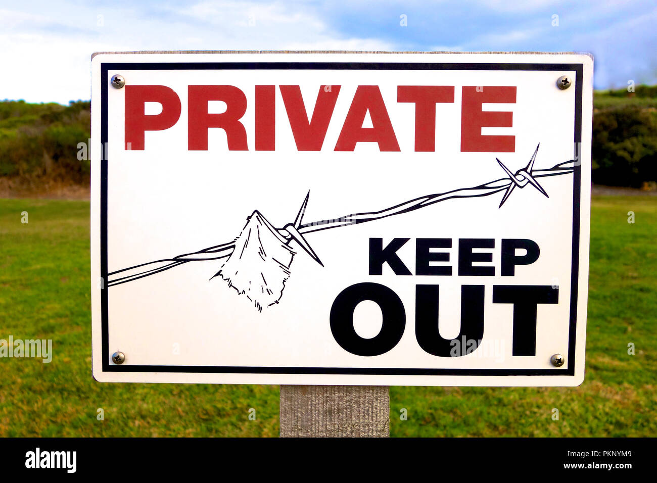 Private Keep Out sign at the entrance of property Stock Photo - Alamy