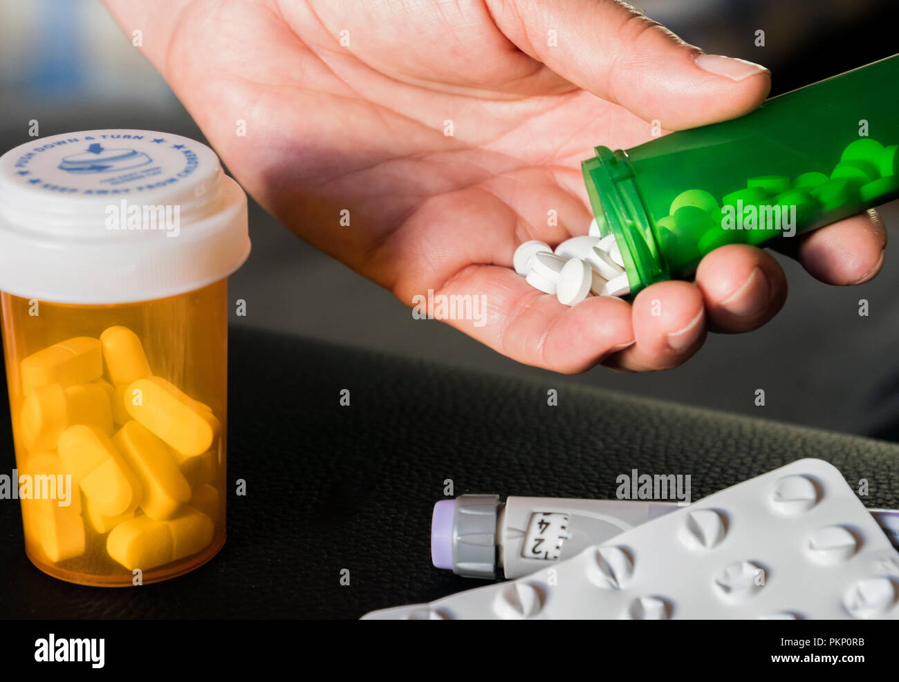 Old male taking medication hi-res stock photography and images - Alamy