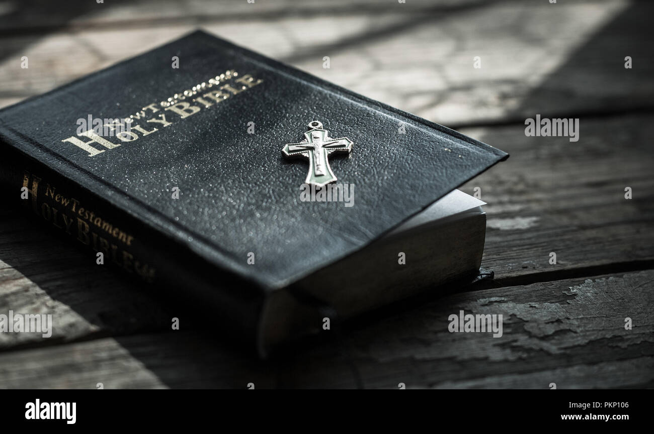 Holy Bible book on old rustic boards. Religion concept Stock Photo - Alamy