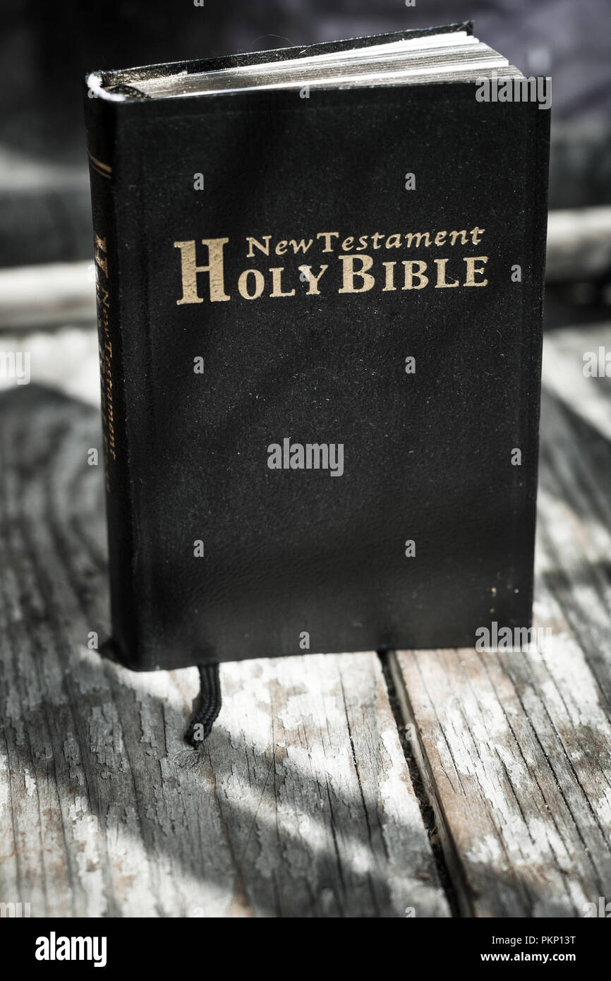 Holy Bible book on old rustic boards. Religion concept Stock Photo - Alamy