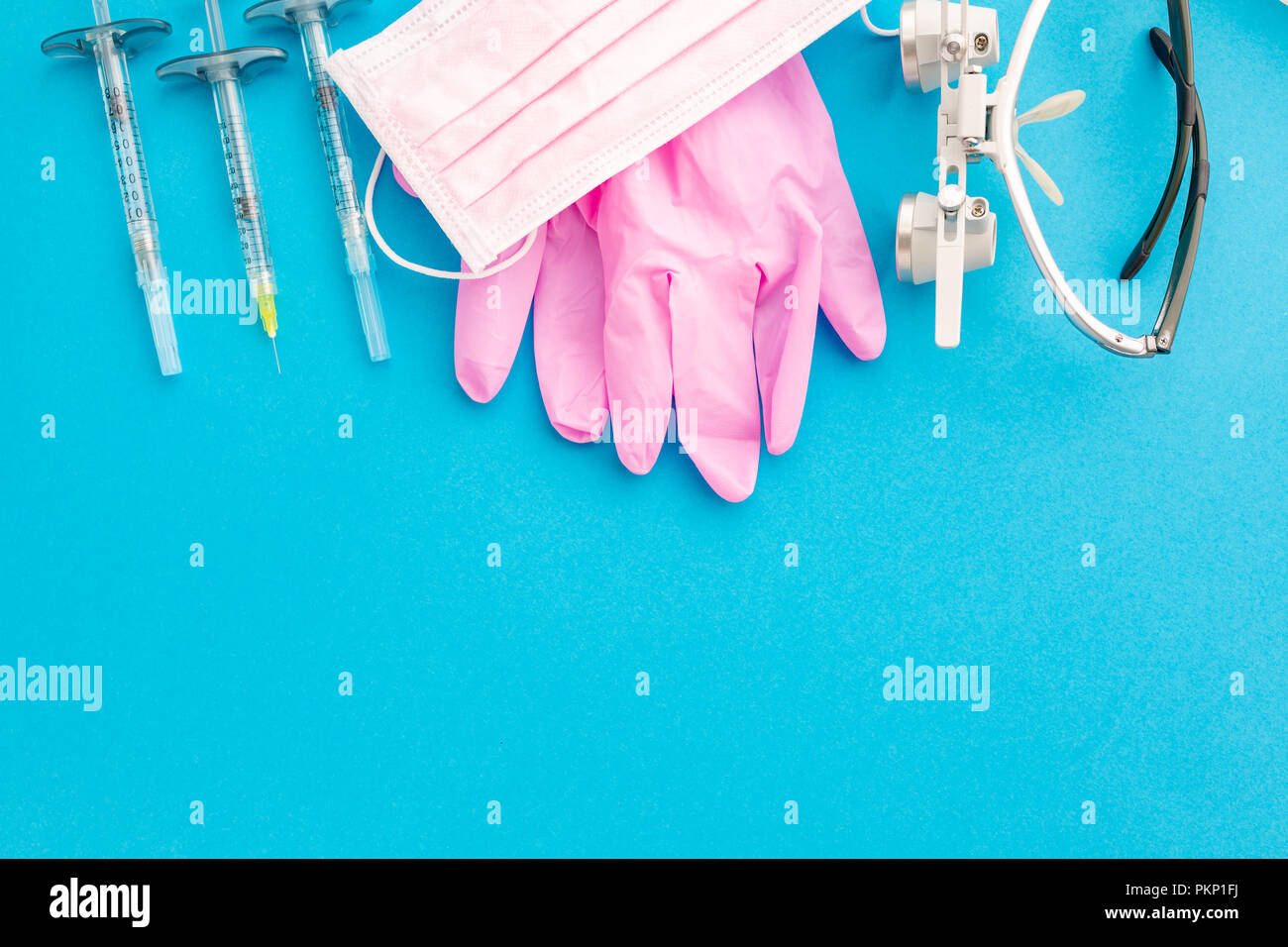Medical equipments including surgical instruments on a blue background ...