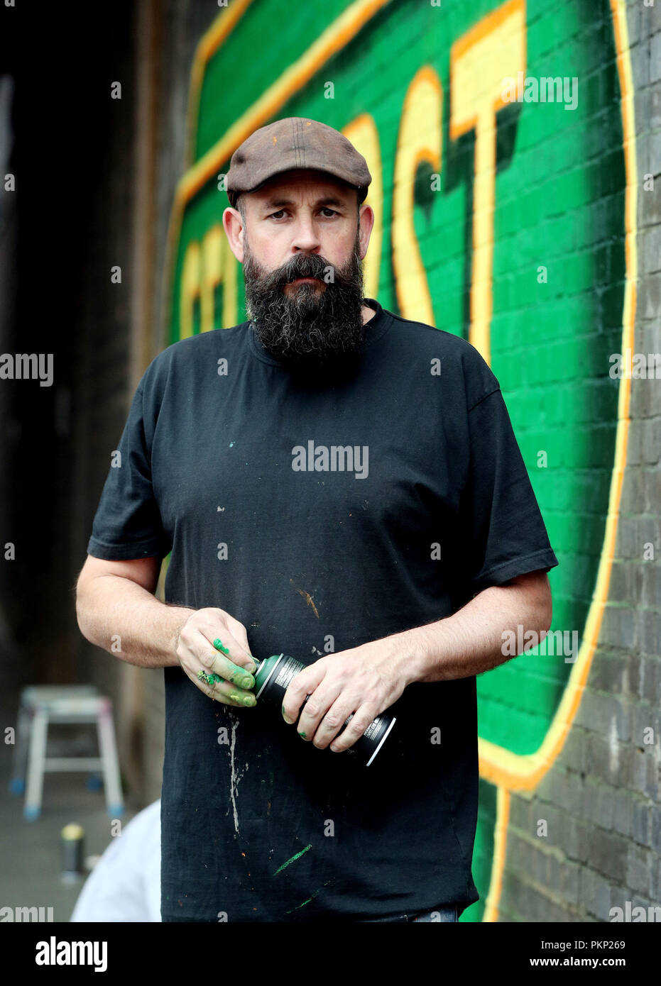 Artist Lionel Stanhope underneath a railway bridge adjacent to Selhurst ...