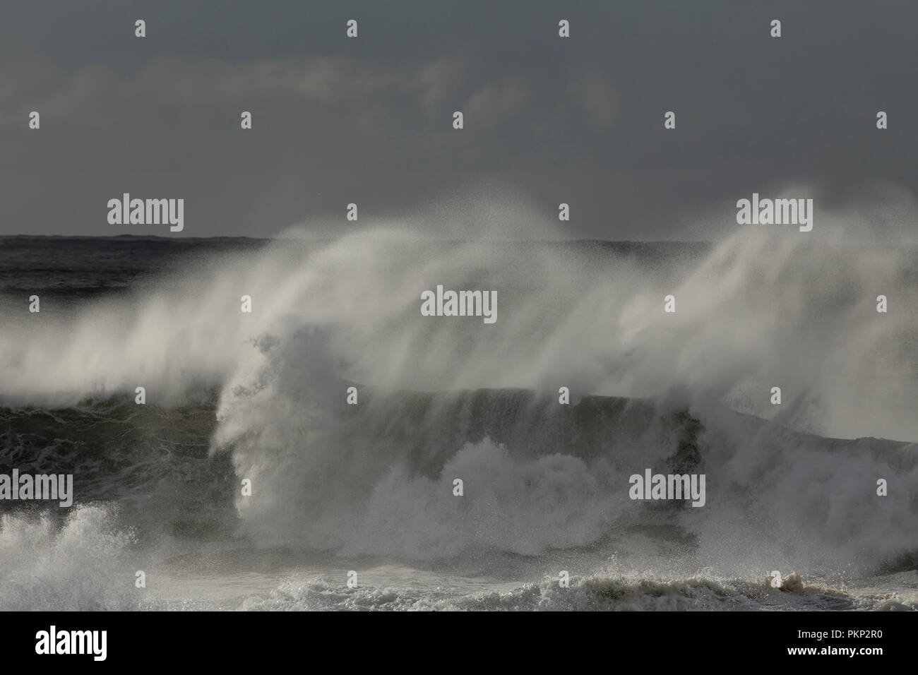 Big windy breaking waves in a stormy afternoon Stock Photo - Alamy