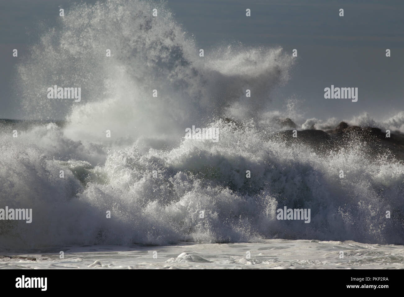 Big stormy breaking waves. Focus on the foreground wave Stock Photo - Alamy