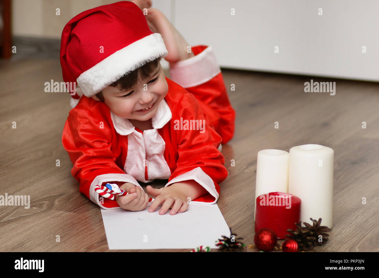 Little kid are writing letter to Santa Stock Photo - Alamy